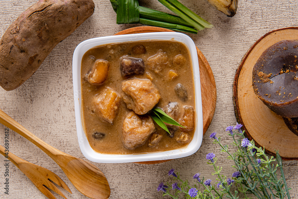 Kolak pisang ubi or banana and sweet potato compote is popular dessert ...