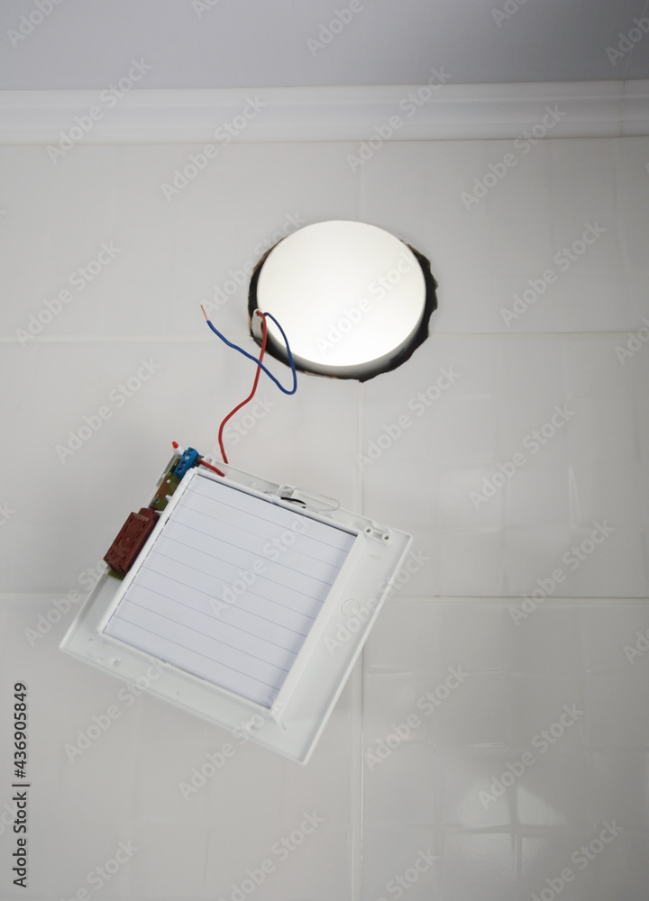Wiring installation of a bathroom exhaust fan. Connecting the house ...