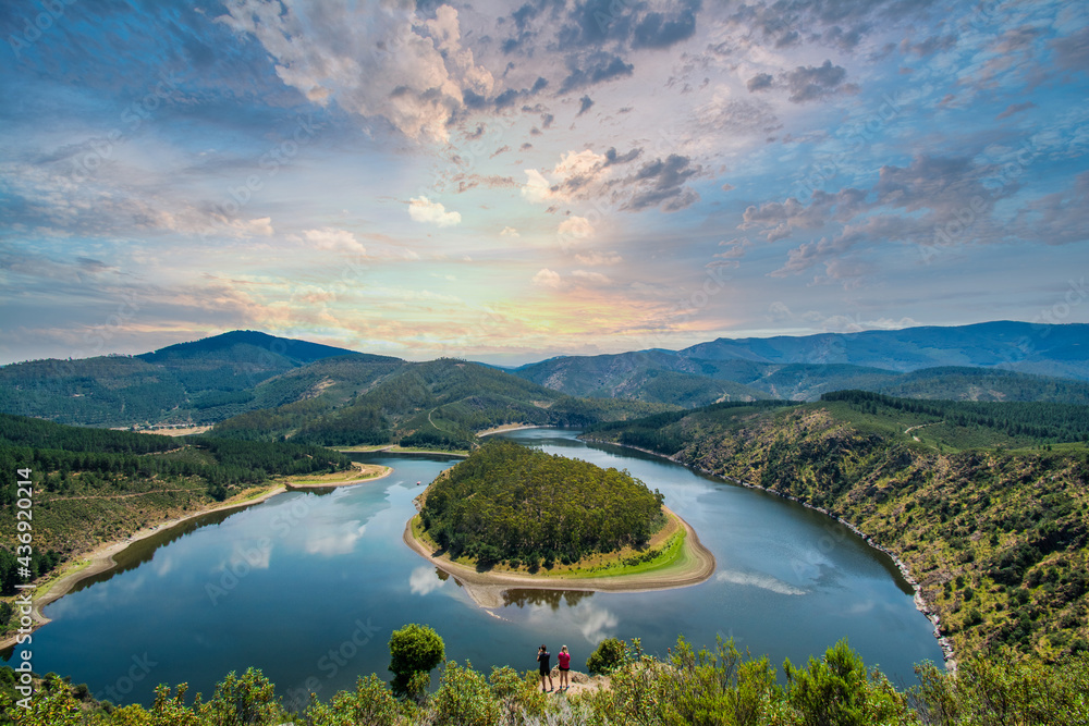 2 Young Tourists Taking Pictures Of A Spectacular Landscape. Meander Of ...