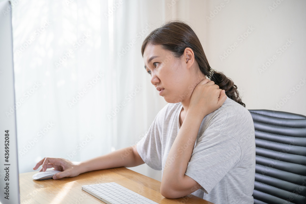 Young Asian woman having an office syndrome health problem. Stock Photo ...