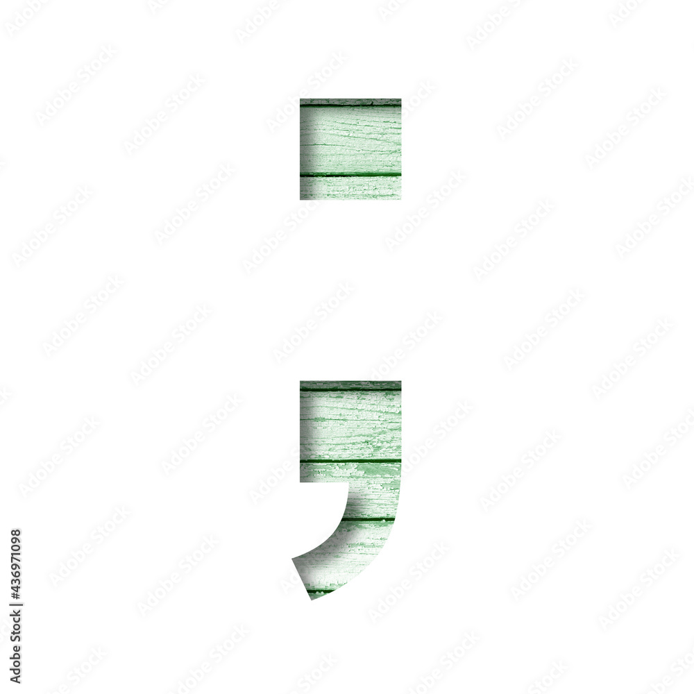 Font on an old wooden wall. Punctuation marks dot and comma cut out of ...