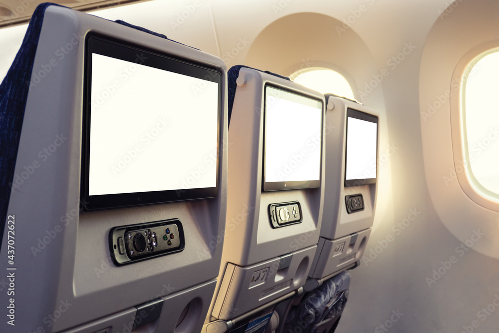 Row airplane seat with empty display and joystick by window Stock-Foto ...