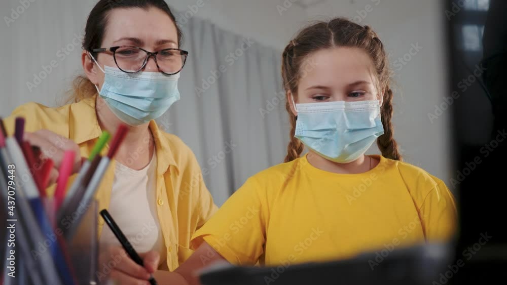 Happy family. Distance learning in a mask. Online school. Teamwork ...