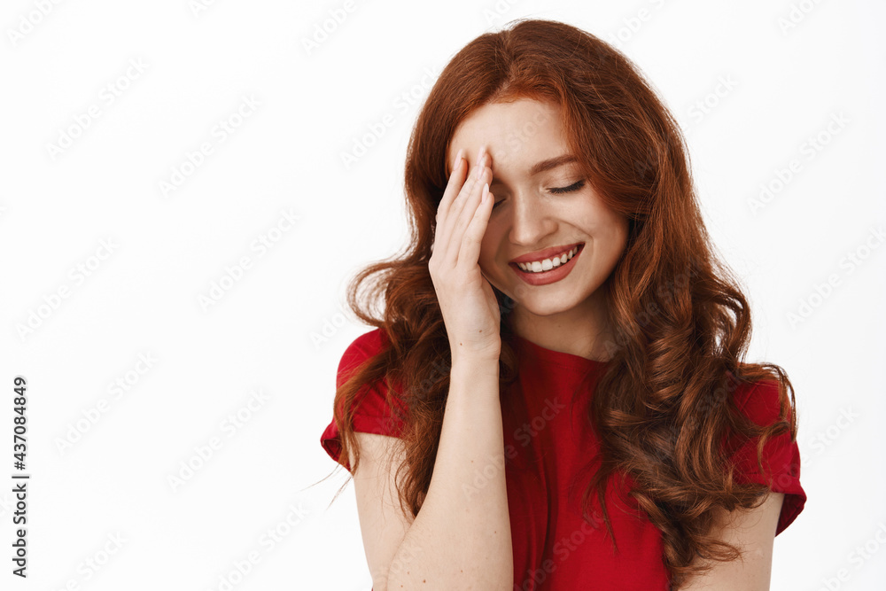 Beautiful ginger girl cover face and blushing, smiling romantic ...