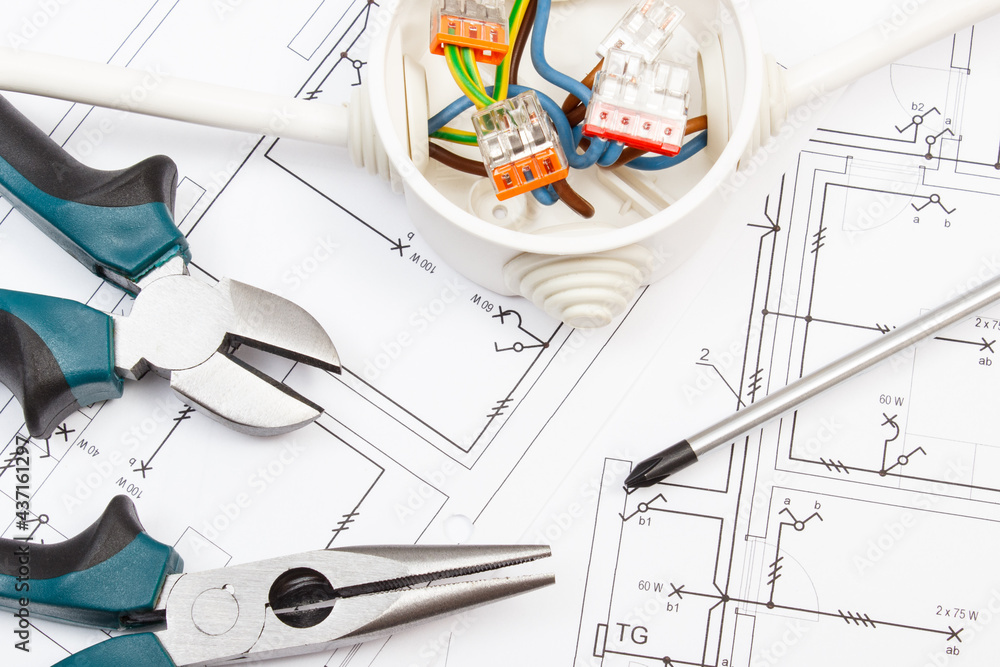 Tools using for works, electric box with connected cables and diagrams ...
