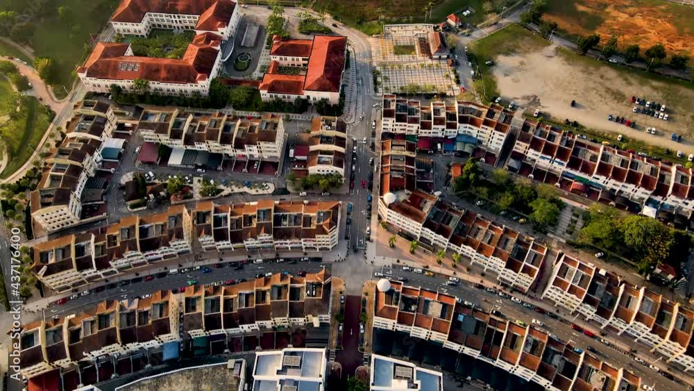 4K cinematic footage top down view of commercial building and shop ...