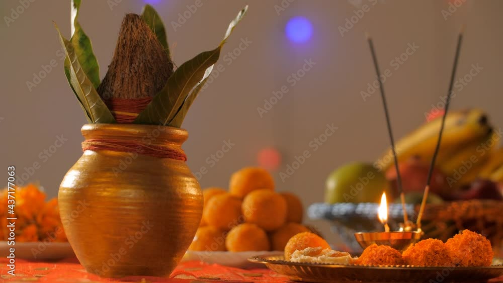 Hindu puja thali and copper Kalash with mango leaves and coconut for ...