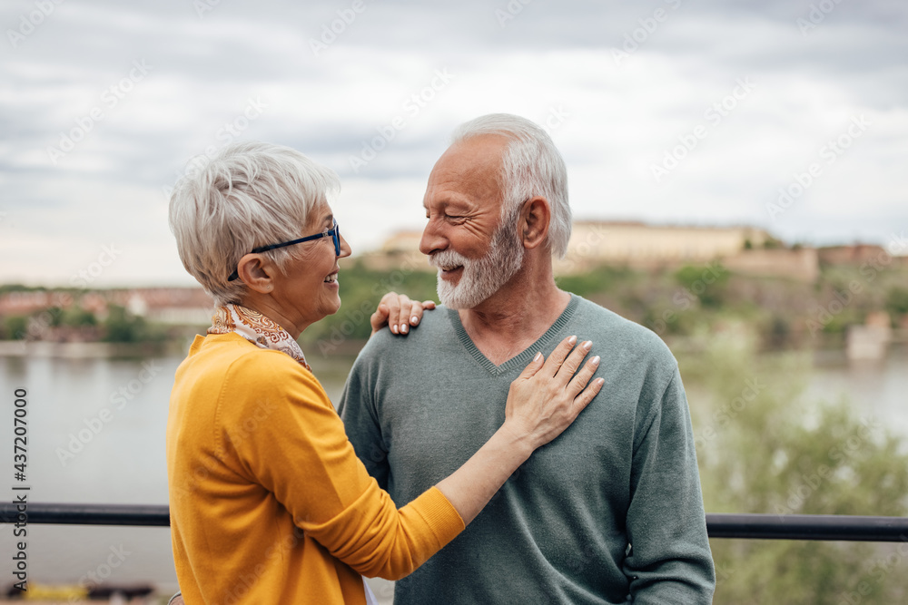 Mature couple, reminiscing about their life together. Stock Photo ...