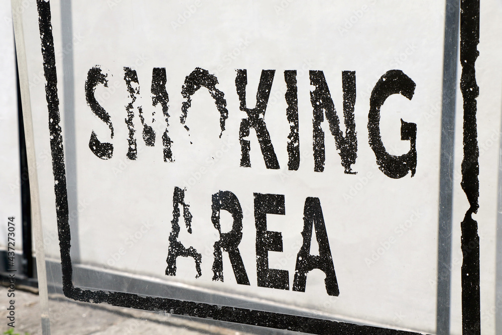 Sign indicating the smoking area in a public place. Texture information ...
