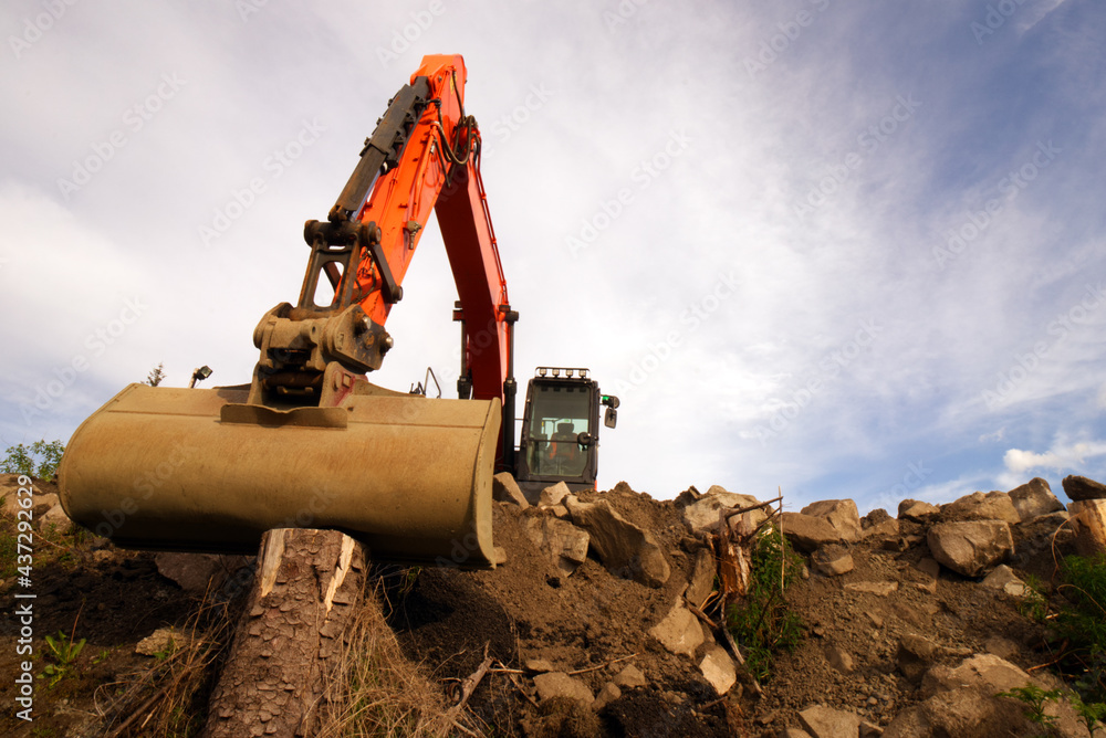 Excavators are heavy construction equipment consisting of a boom ...