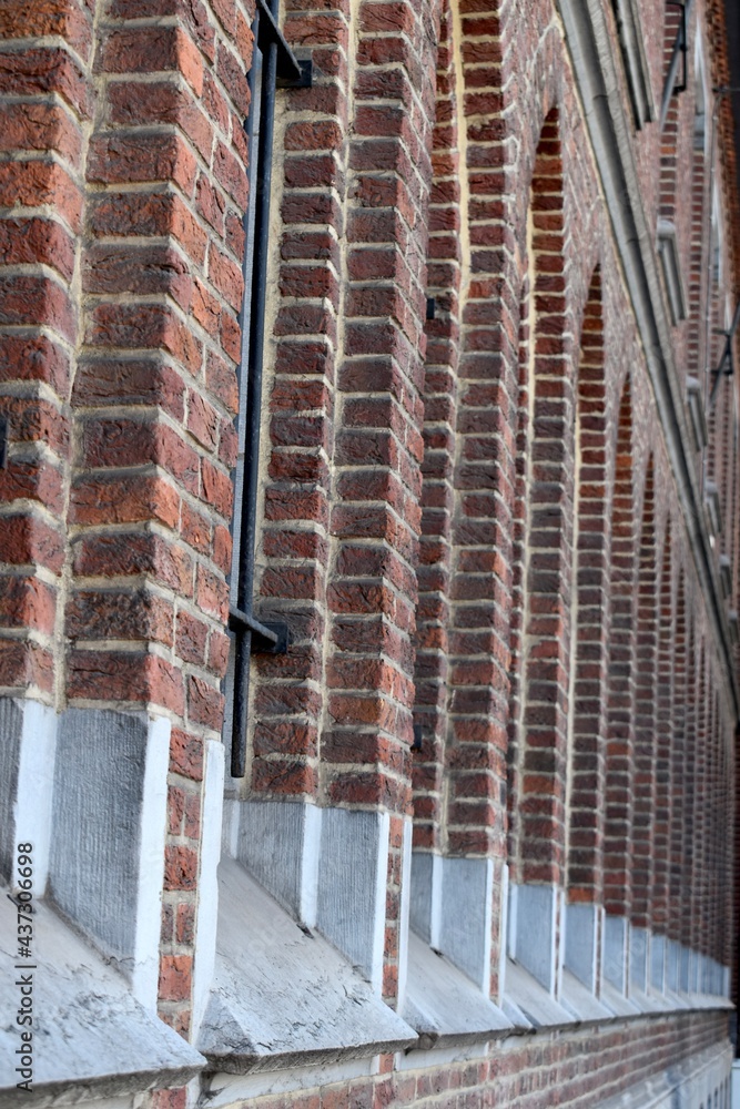 Exterior of a Brick wall building and window arches Stock Photo | Adobe ...