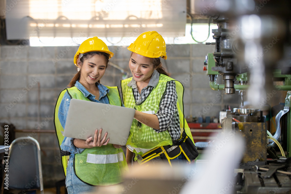 Asian engineering and worker woman in safety hard hat and reflective ...