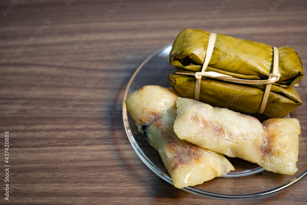 Khao Tom Mud is a Thai dessert made from sticky rice wrapped in bananas ...