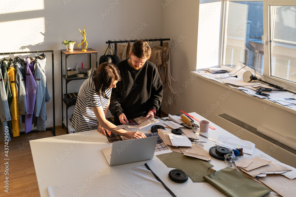 Fashion designers team choose colors and material for new collection ...