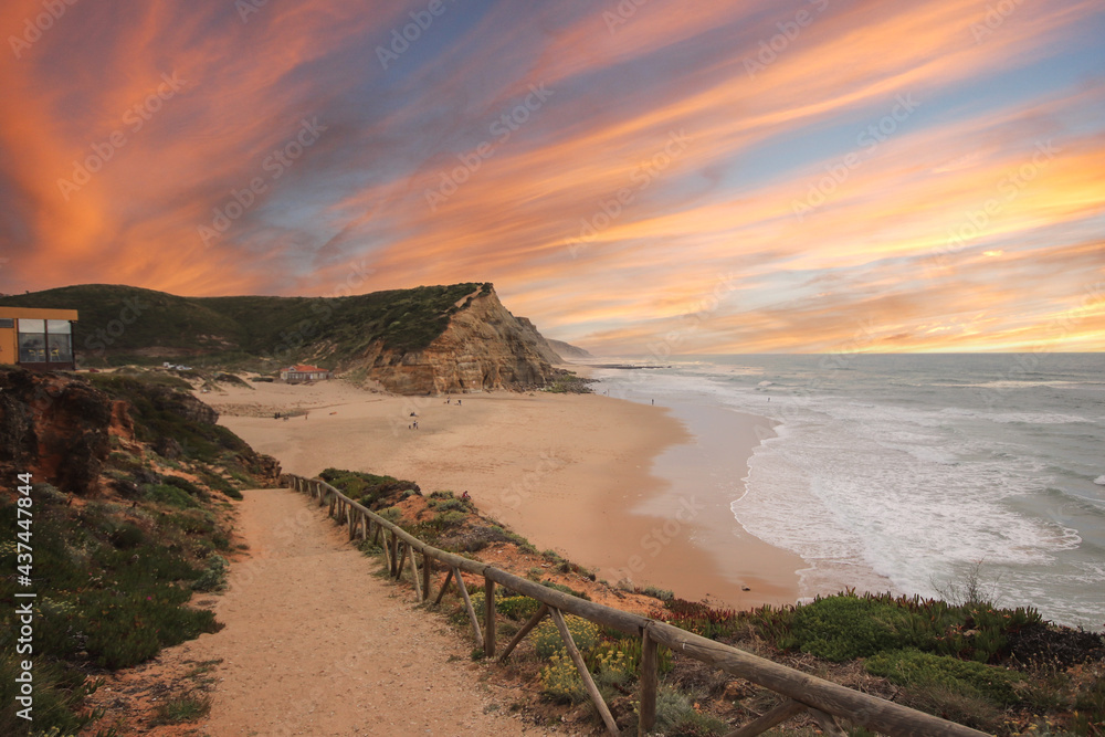 Beautiful sandy ocean beach and cliff at the sunset. Panorama atlantic ...