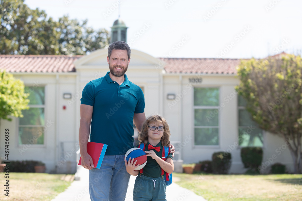dad and son after come back from school. happy family value. childhood ...
