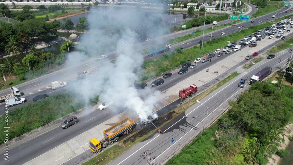Aerial View: Rescue Team of Firefighters and Paramedics Work on a Car ...