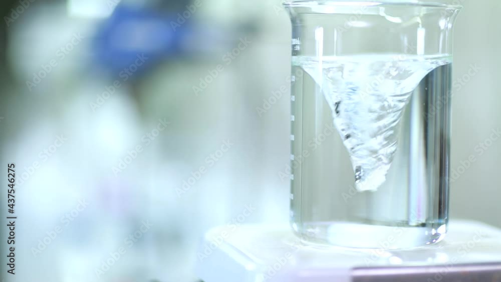 Twisting water in beaker by Spinning water vortex machine Stock Video ...