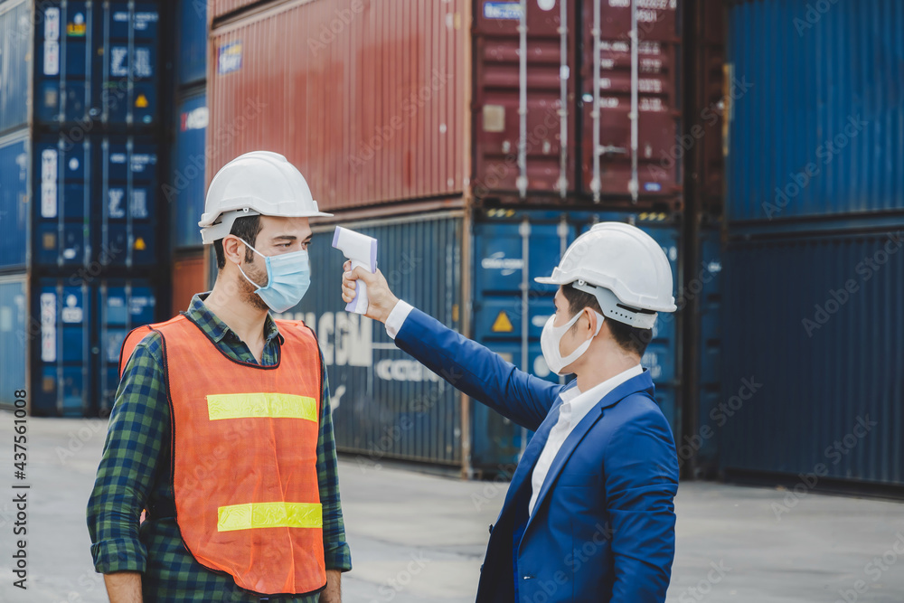 factory worker man body temperature checking fever by digital ...