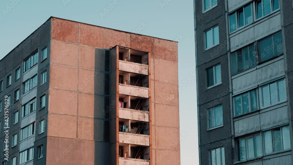 Sunset, architecture of authentic Soviet buildings, view of a gray ...