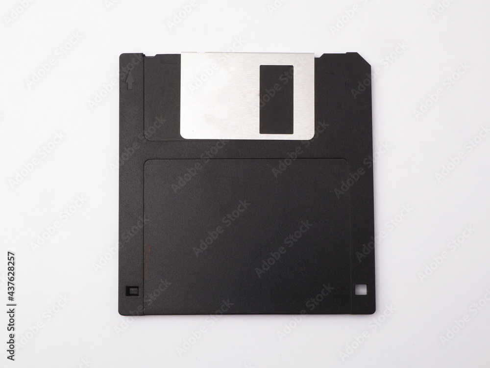 Retro vintage floppy disk diskettes on white, old time computer storage ...