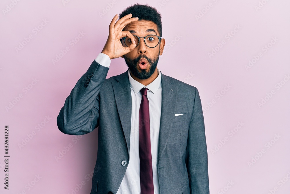 Handsome hispanic business man with beard wearing business suit and tie ...