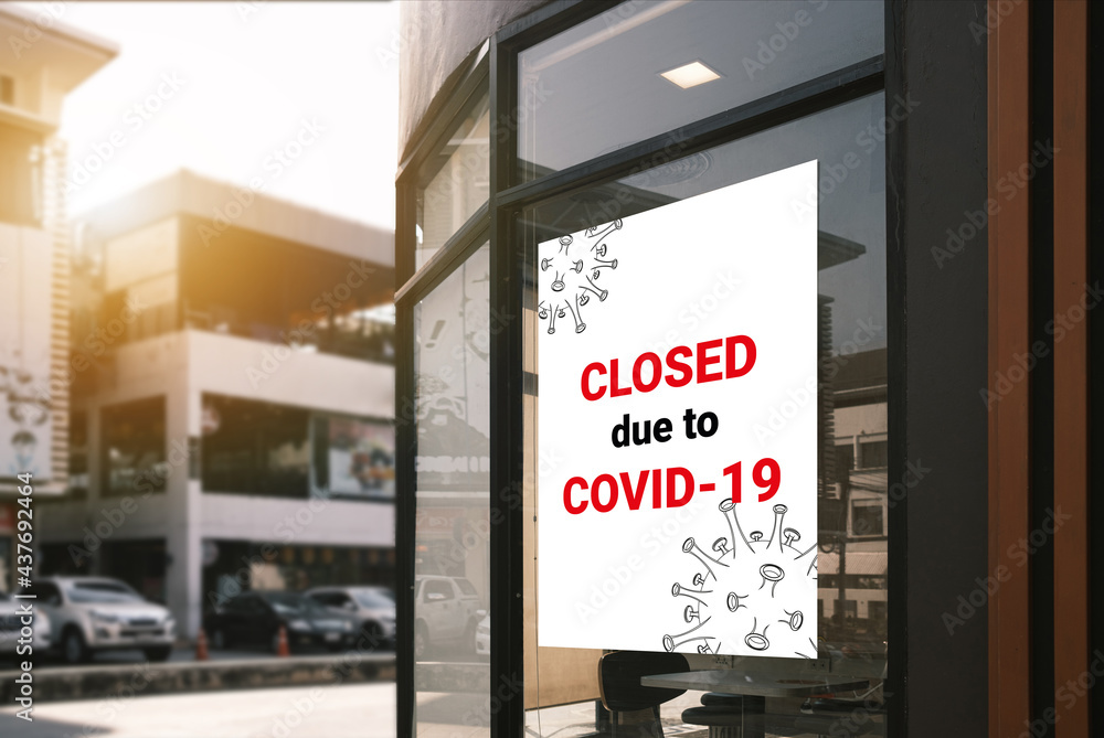 Posters announce in front of business offices or stores that have ...