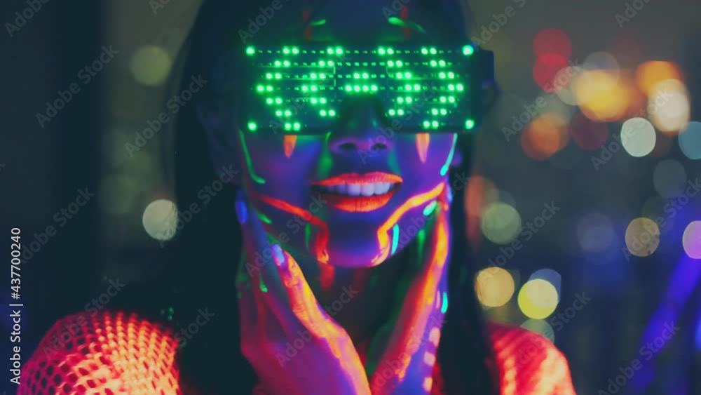 Neon asian woman dancing. Fashion model woman in neon light, portrait ...