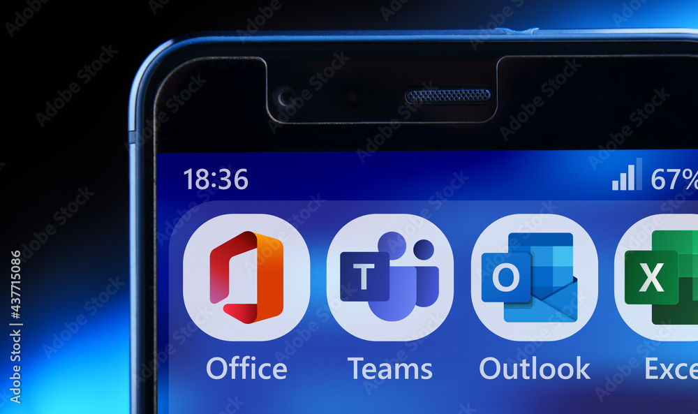 Hand holding smartphone displaying a set of Microsoft programs Stock ...