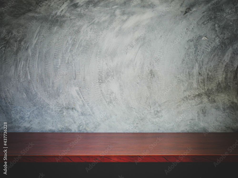 The table has a backdrop of plaster walls. used for displaying products ...