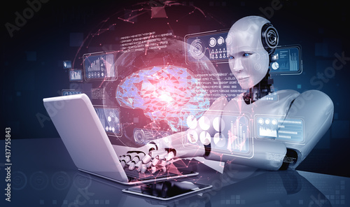 Robot humanoid use laptop and sit at table for big data analytic using AI thinking brain ...