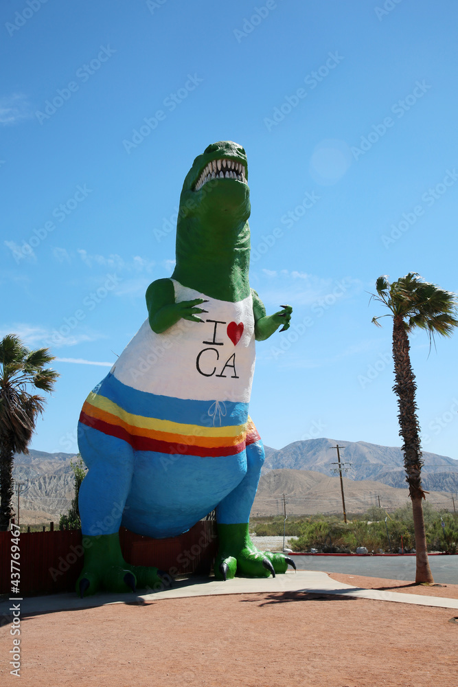 June 6 2021 - CABAZON, CALIFORNIA USA: A t-rex statue looks up into the ...