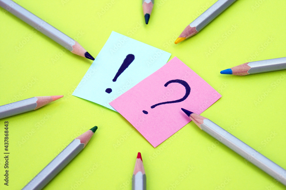 A sticker with a question mark and an exclamation mark and colored ...