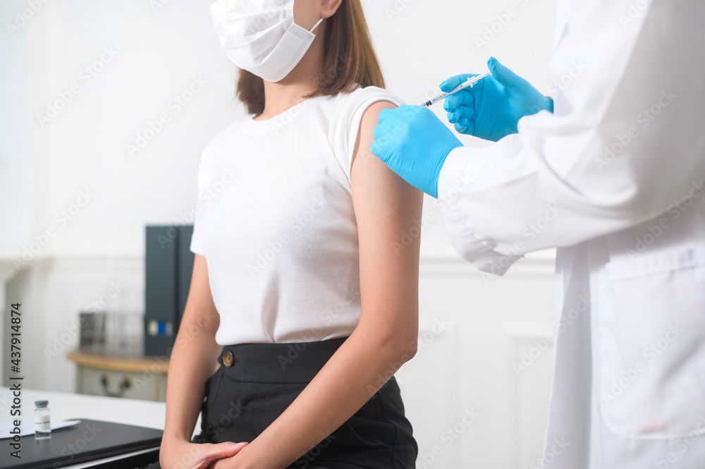 Male doctor injecting covid-19 vaccine to patient arm, covid-19 ...