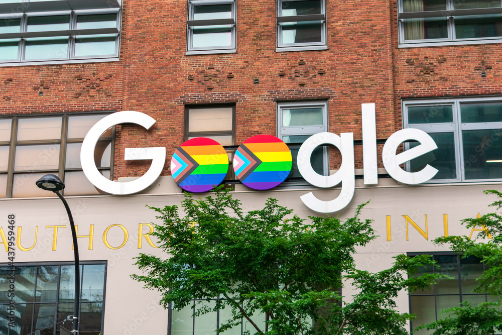 Google sign, logo decorated in the rainbow colors in honor of LGBT ...