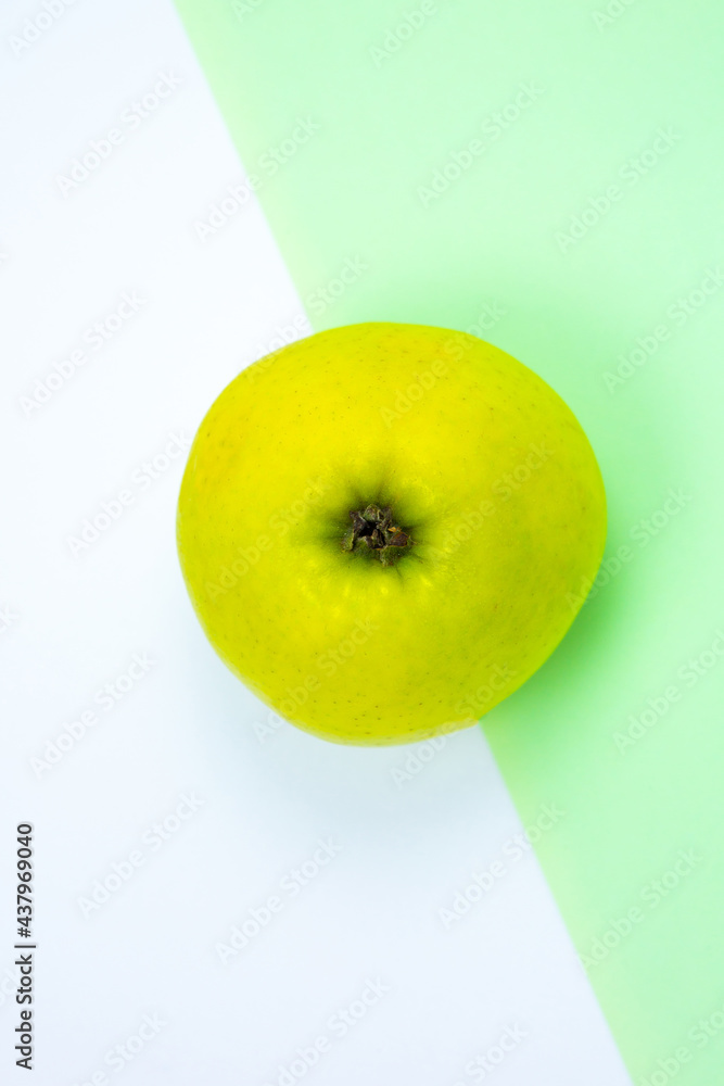 Close up photo of Green Apple Fruit on the white and green background ...
