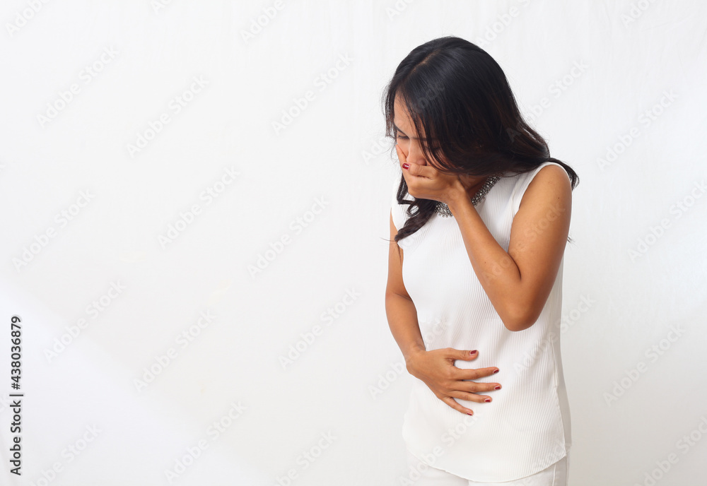 Beautiful Asian Girl Standing Holding Her Stomach And Feeling Nauseous