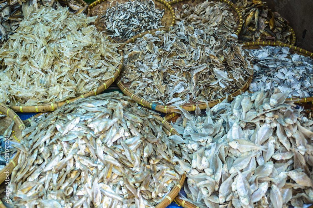 Heaps of salted sun dried fishes or ikan asin, a traditional comfort ...