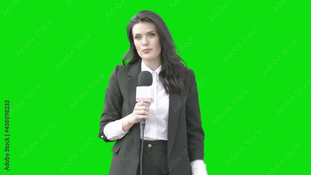 GREEN SCREEN CHROMA KEY Mid 30s Caucasian female TV news reporter in ...