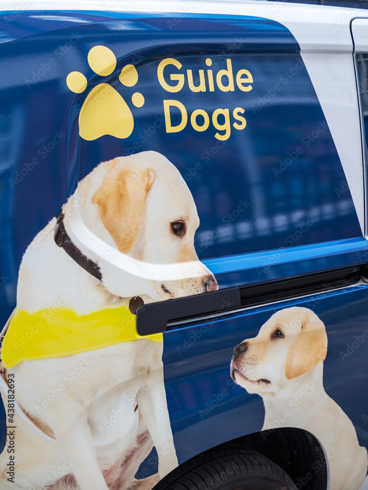 London, UK, June 5th 2021: A guide dogs van with logo. Image of ...
