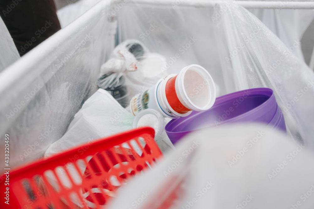 Sorting and collection plastic in trash bag for recycling. Trash bag ...