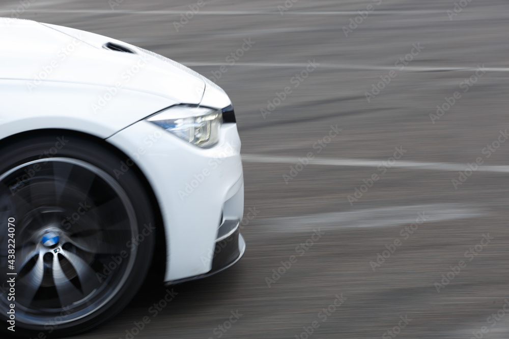 BMW M3 F80 equipped with AC Schnitzer rims and low profile tires racing ...