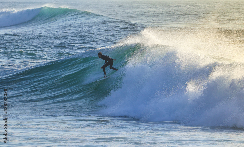 Surfer on Blue Ocean Wave . Surf spot in Ericeira Portugal. Stock Photo ...