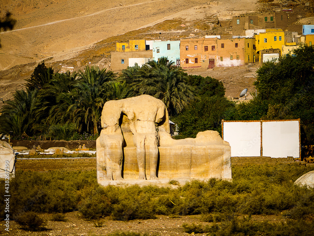 By the Colossus of Memnon in Egypt where a huge city has recently been ...