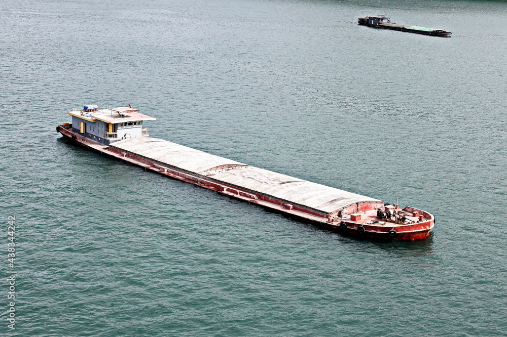 Seagoing vessels, barges, tugboats and small boats at the roadstead of ...