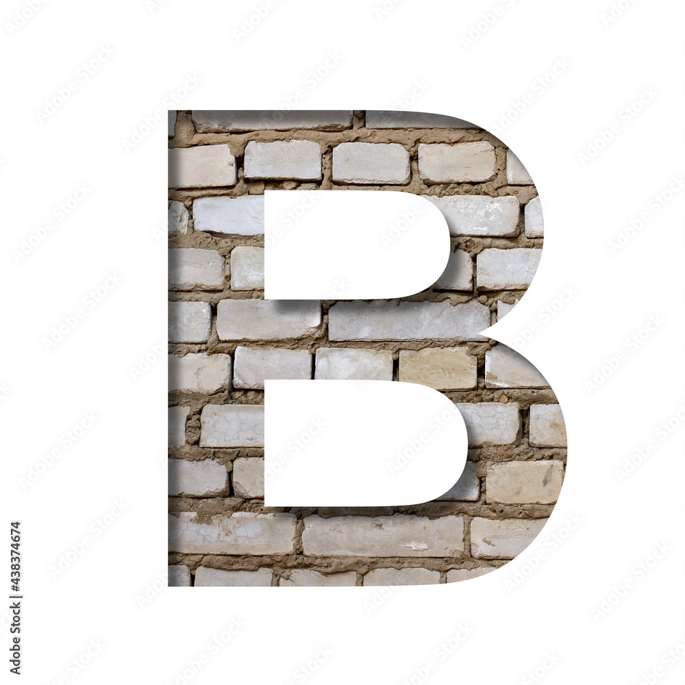 Font on white brick. The letter B is cut from white paper the ...