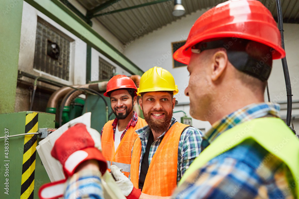 Construction workers team at the project planning in the factory Stock ...