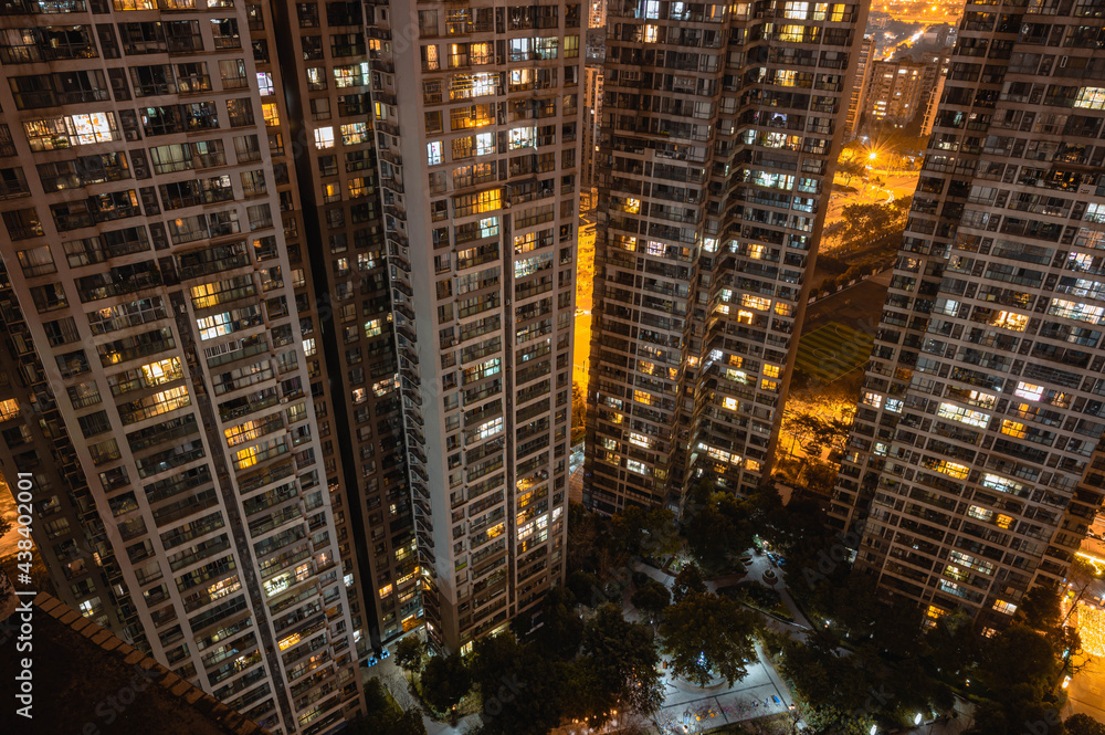 Long exposure night aerial view on residential buildings complex ...