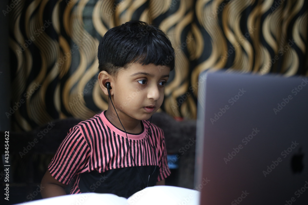 Asian child attending online school using computer, Little Boy Sitting ...