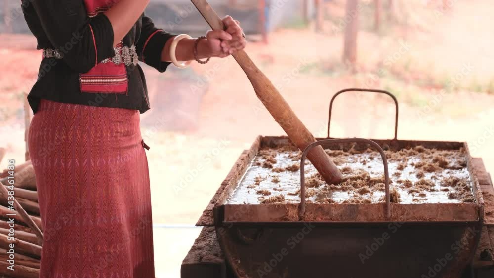 Close up woman use timber or wood spatula to mix piece of mixture ...